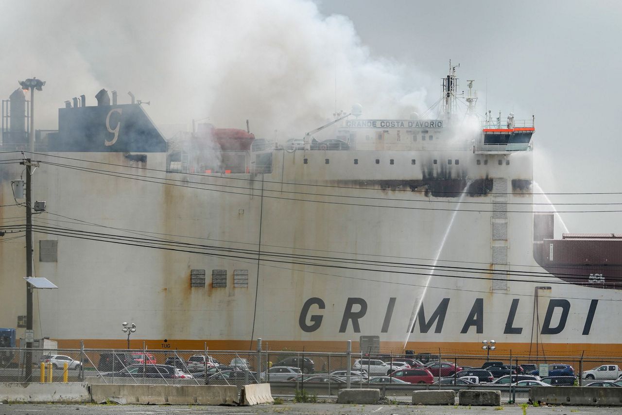 Fatal fire still burns on cargo ship in New Jersey, raising questions ...