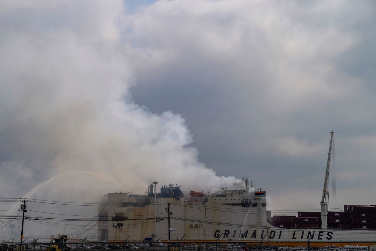 Fatal fire still burns on cargo ship in New Jersey, raising questions ...