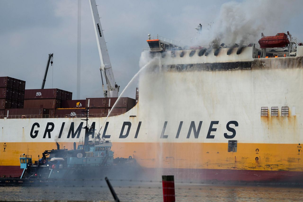 Fatal fire still burns on cargo ship in New Jersey, raising questions ...