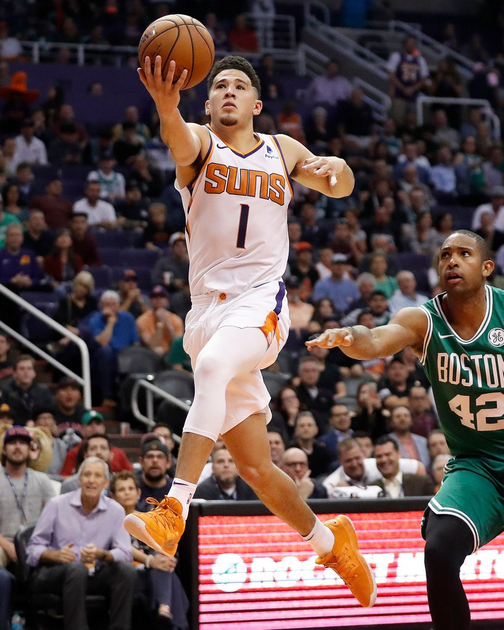 Irving, Celtics rally from 22 down to top Suns 116-109 in OT