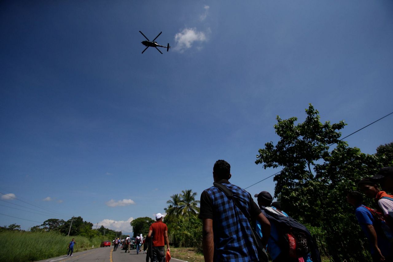 The Latest: Growing migrant caravan renews march to US