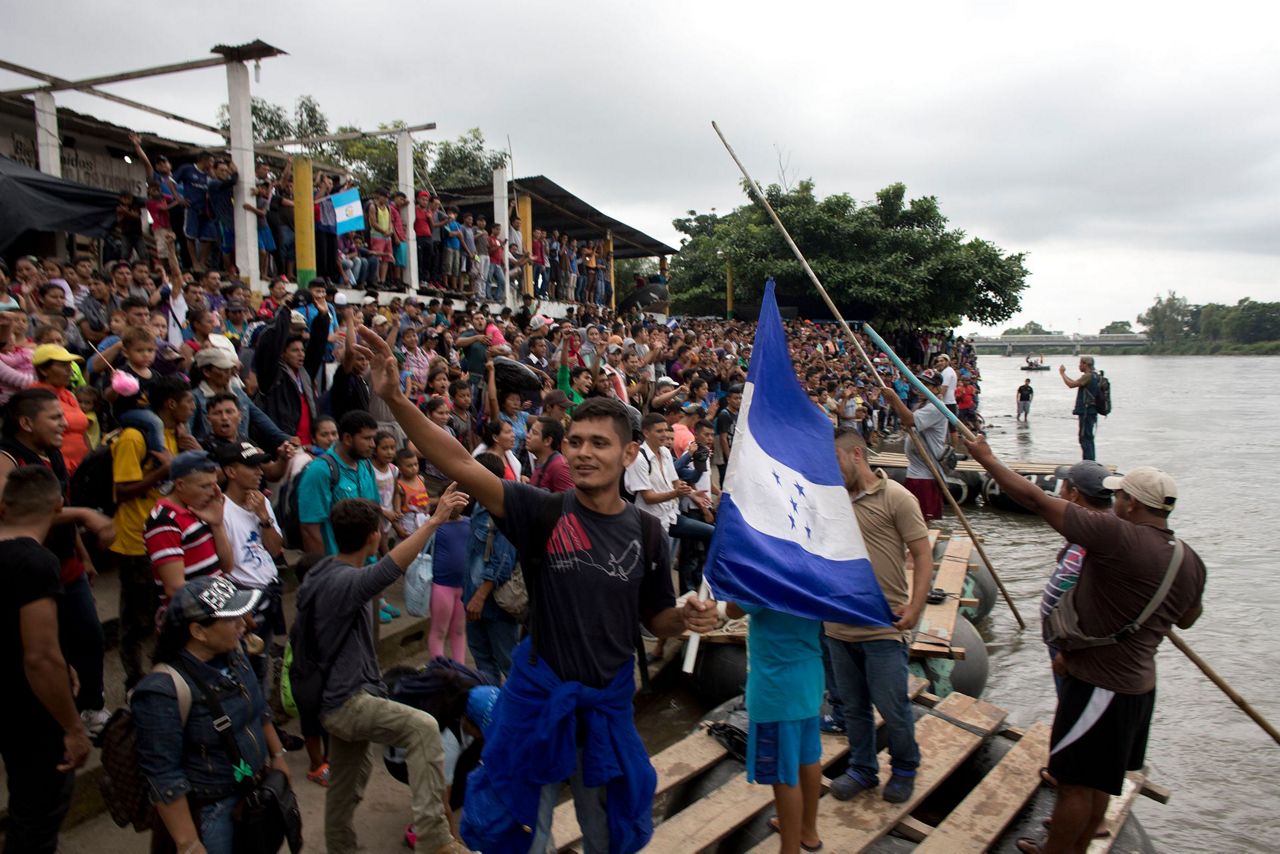 Migrants, police mass in town on Guatemala-Mexico border