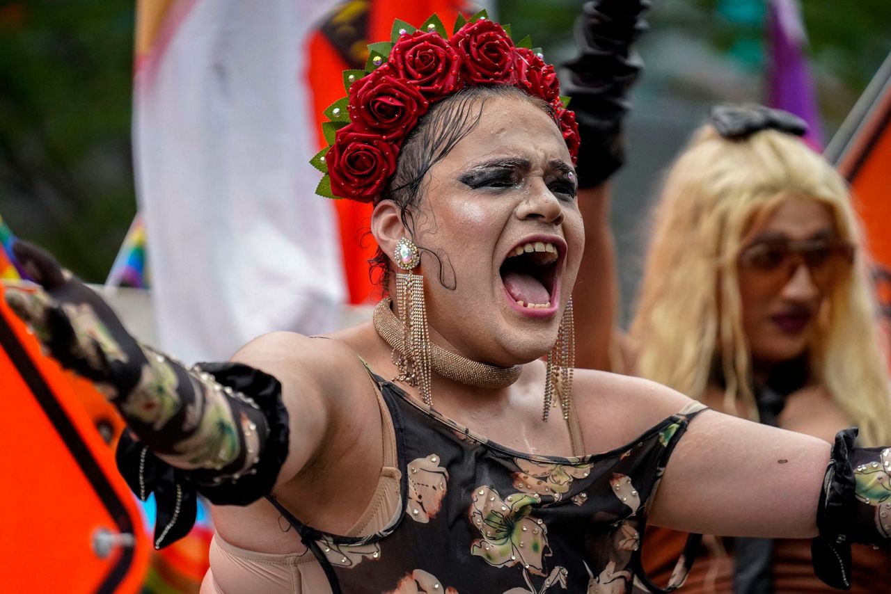 Party and protest mix as LGBTQ+ pride parades kick off from New York to ...