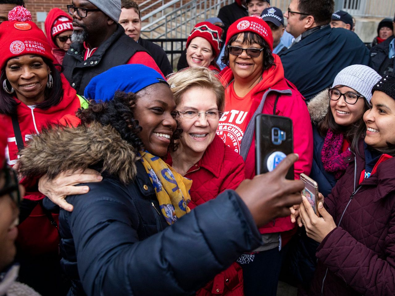 Warren joins striking Chicago teachers as negotiations stall
