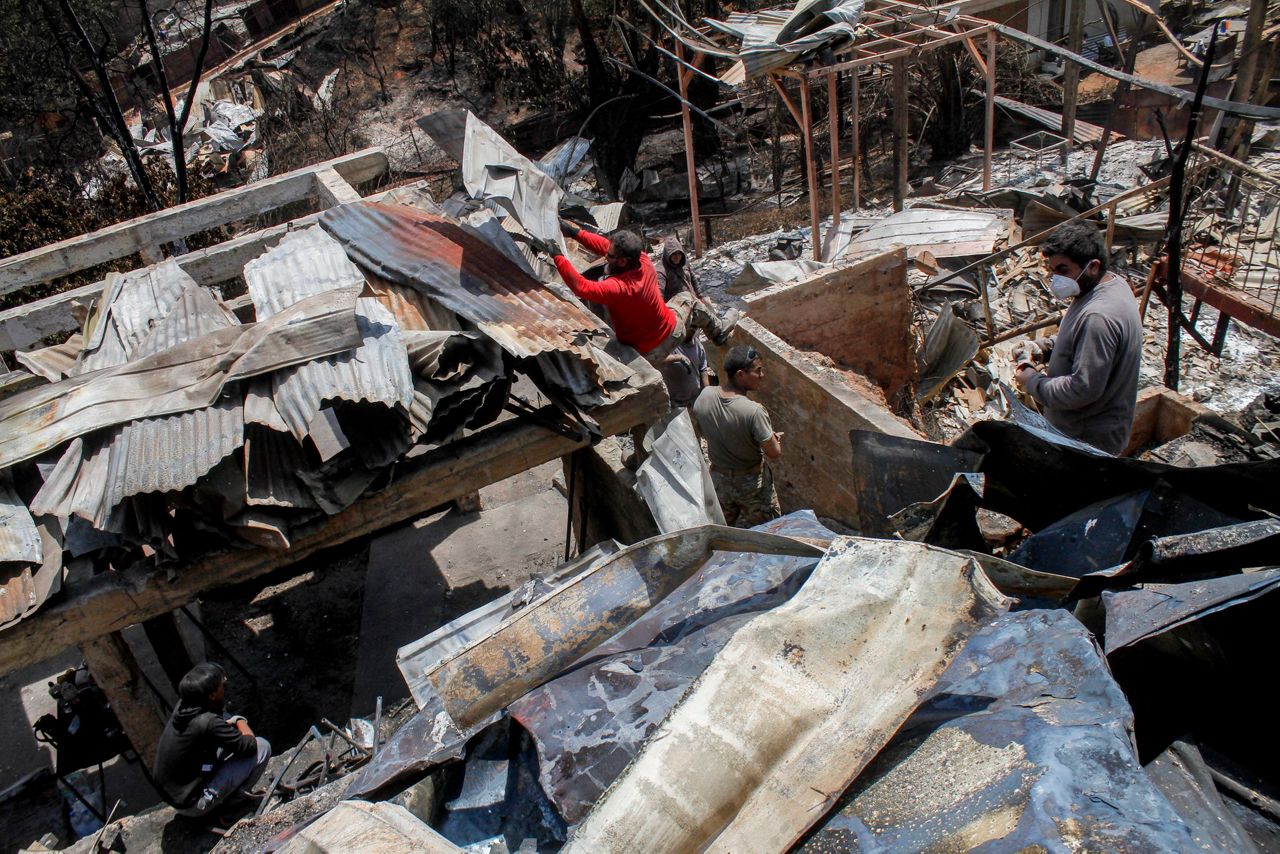 Forest fires rage on in central Chile killing at least 64