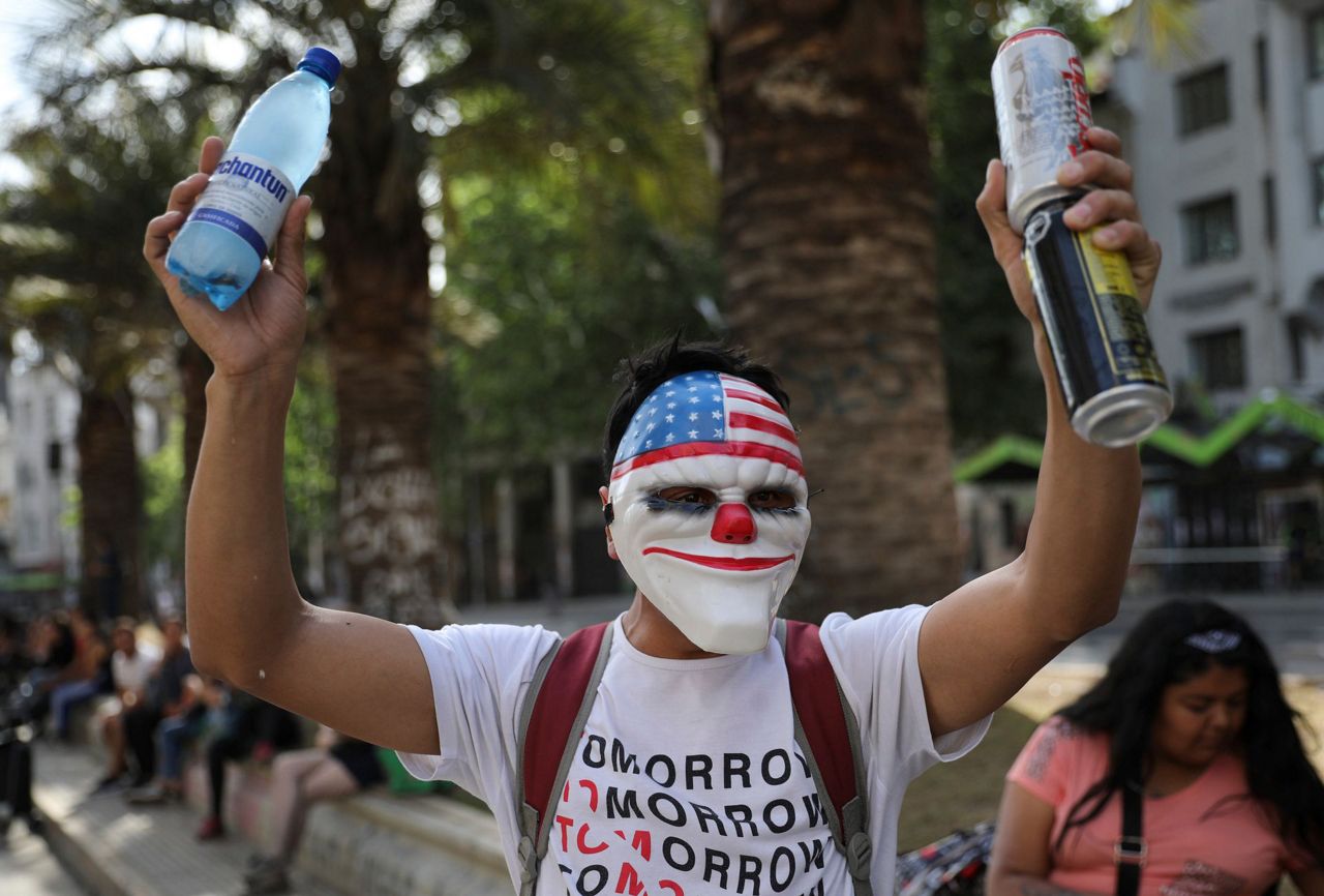 Thousands March In Chile Protest After Summit Cancellations