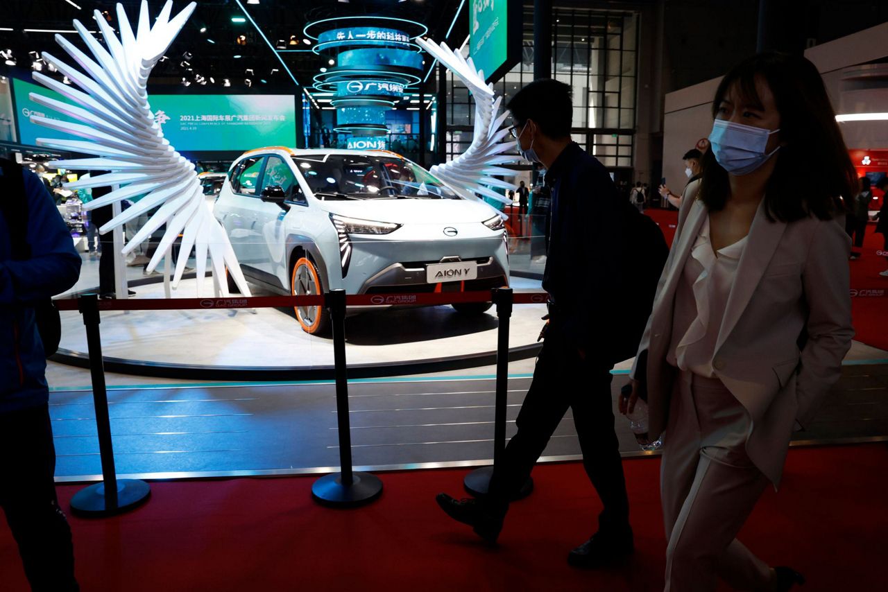 VW, Ford unveil SUVs at China auto show under virus controls