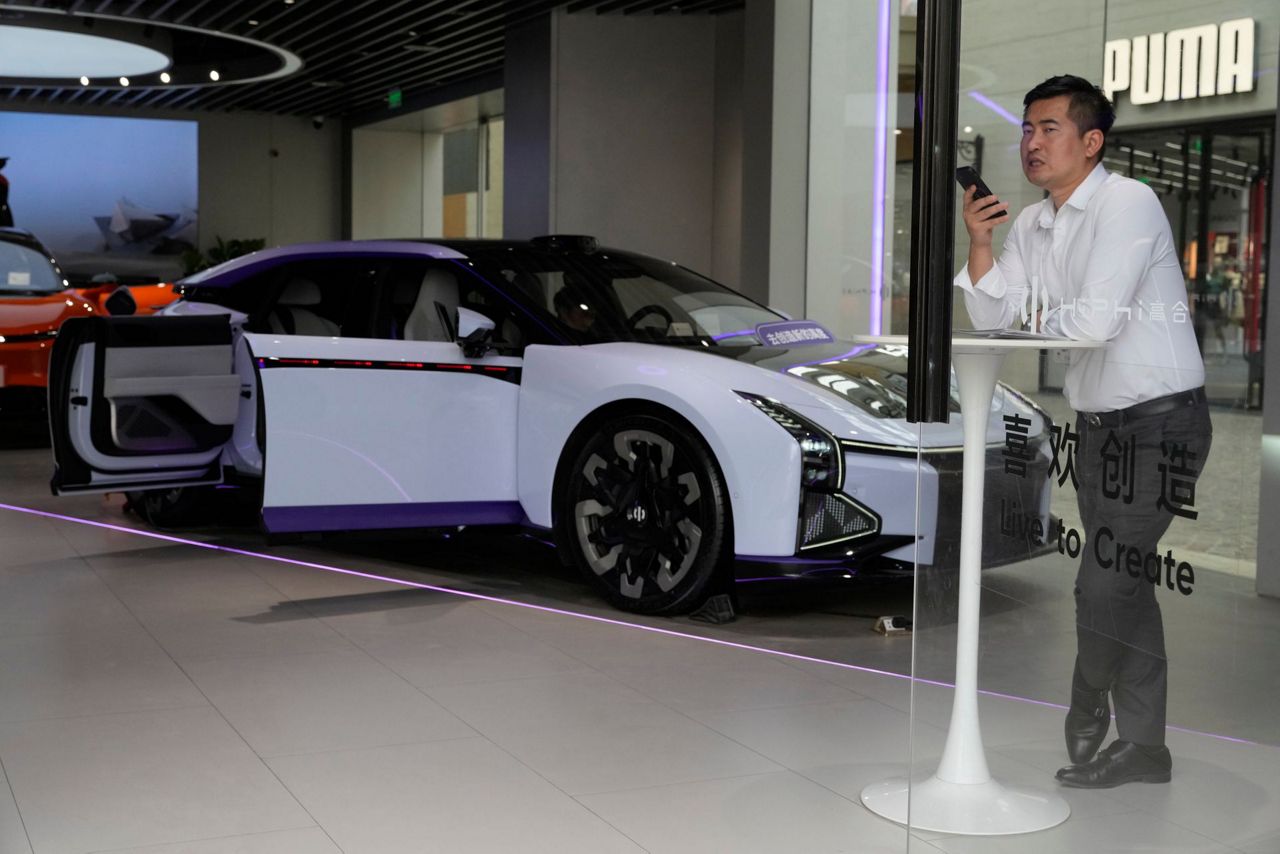 China auto show highlights intense electric car competition