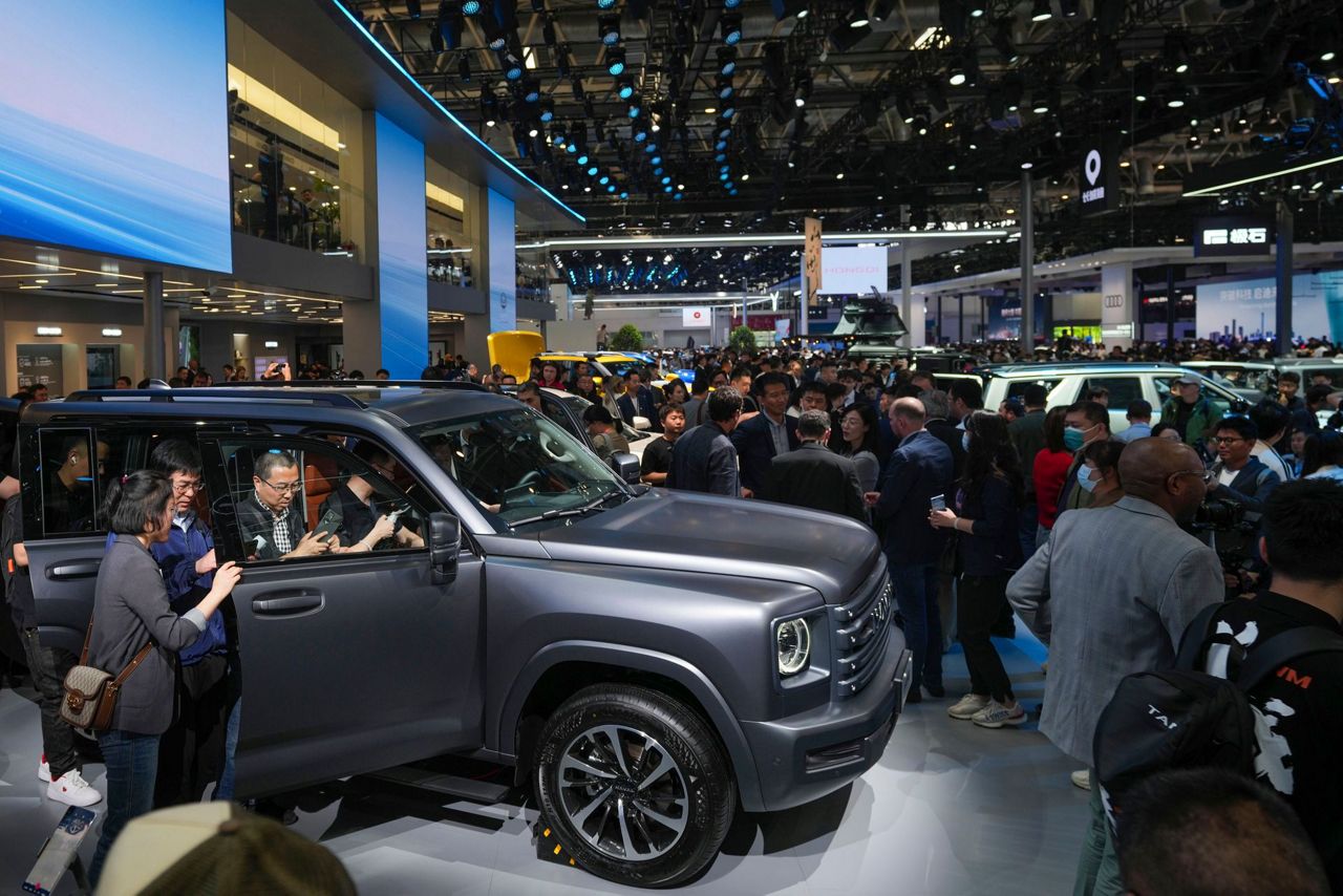 Electric cars and digital connectivity dominate at Beijing auto show