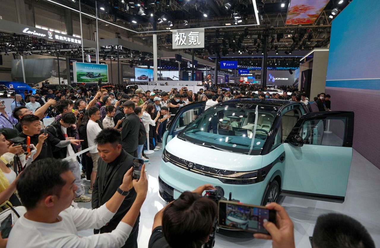 Electric cars and digital connectivity dominate at Beijing auto show