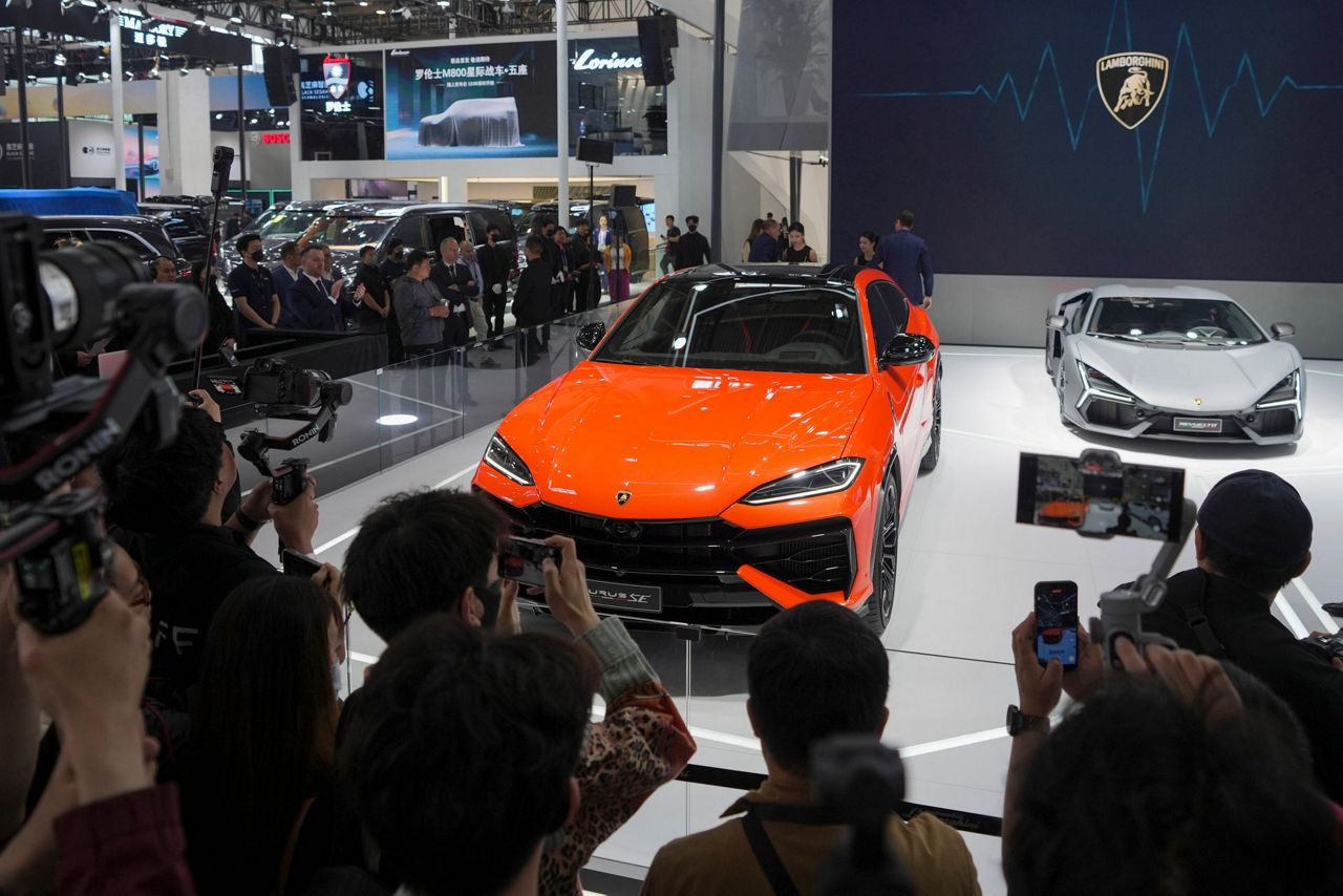 Electric cars and digital connectivity dominate at Beijing auto show
