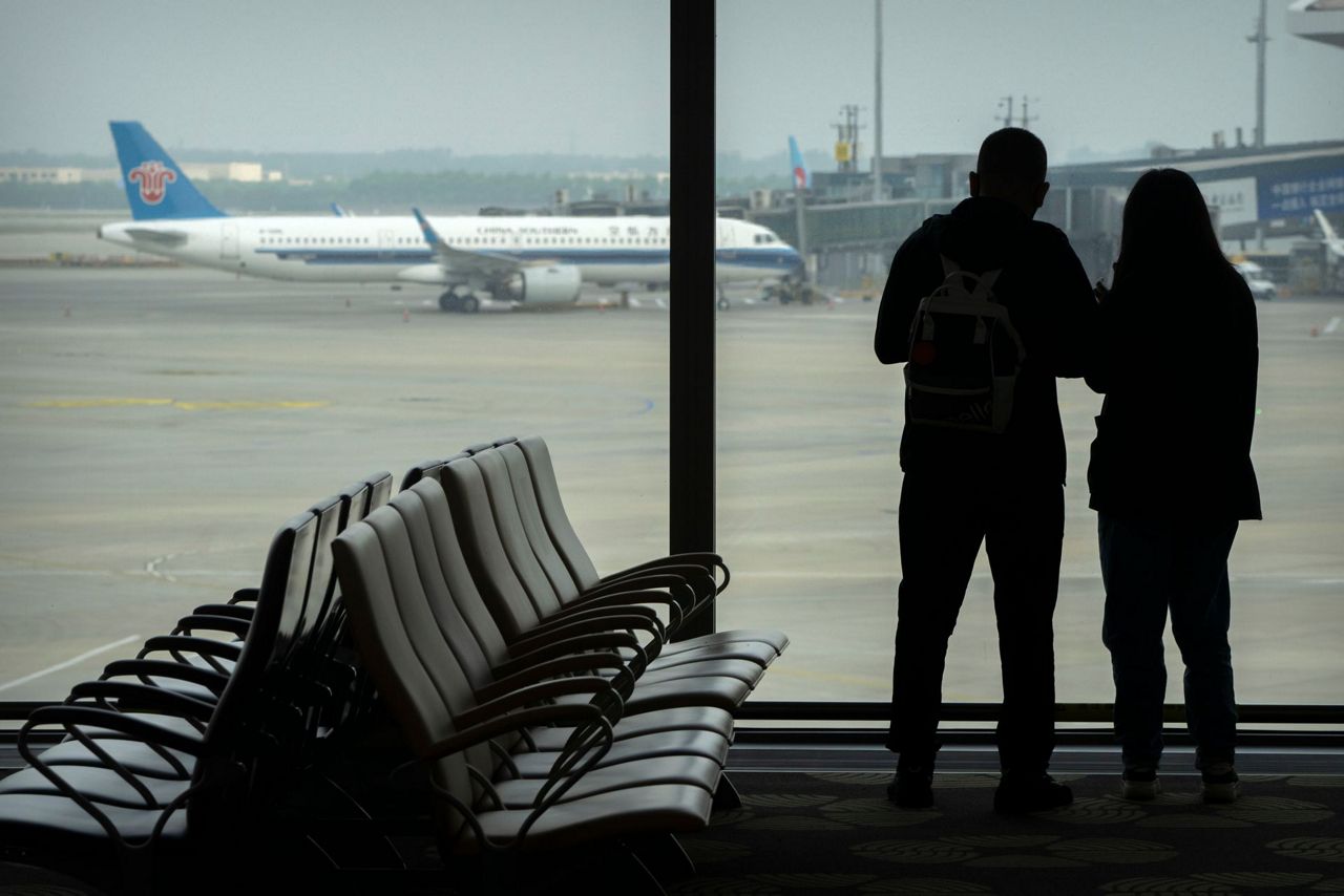 China's 1st domestically made passenger plane completes maiden ...