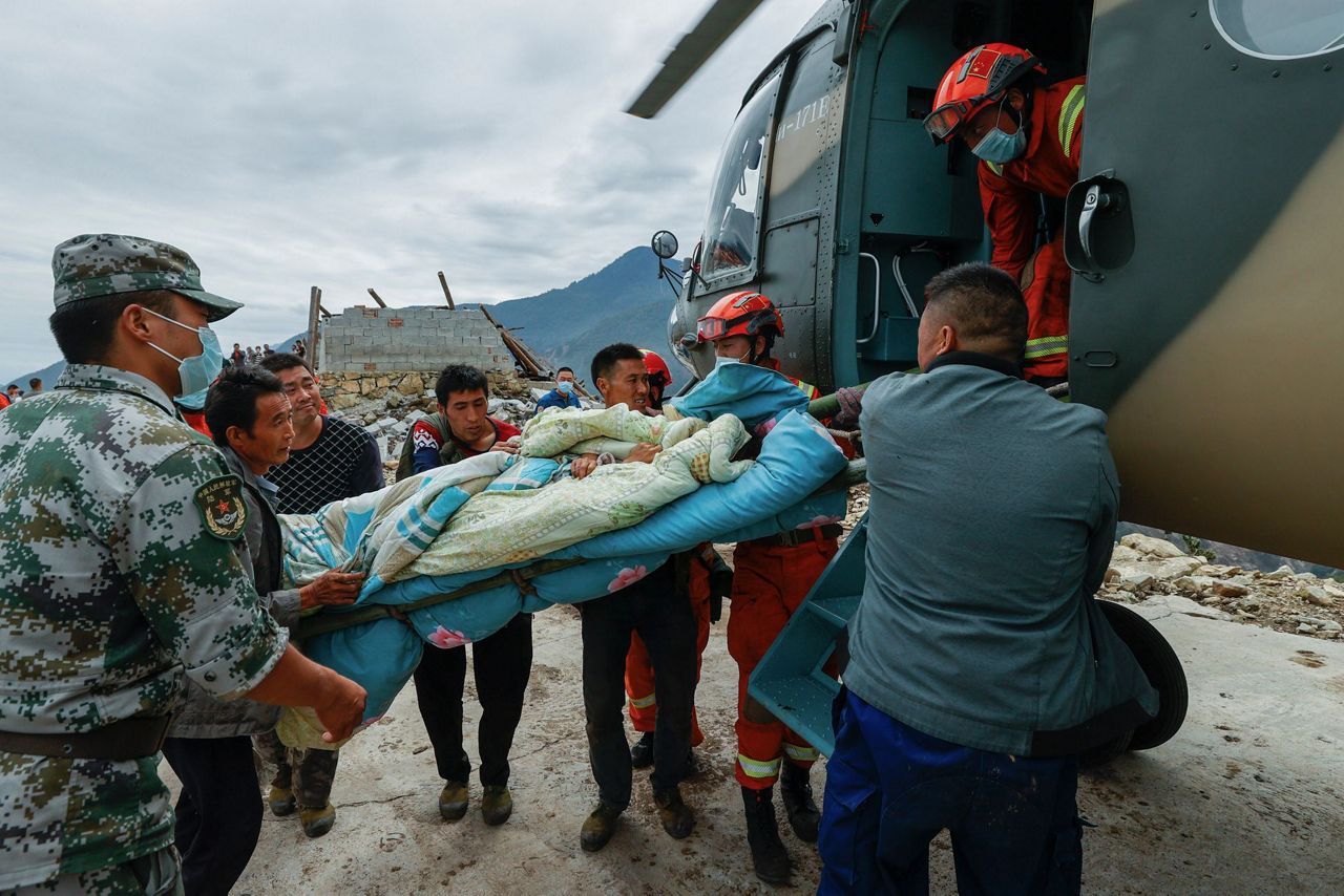 China earthquake deaths rise to 74 as lockdown anger grows