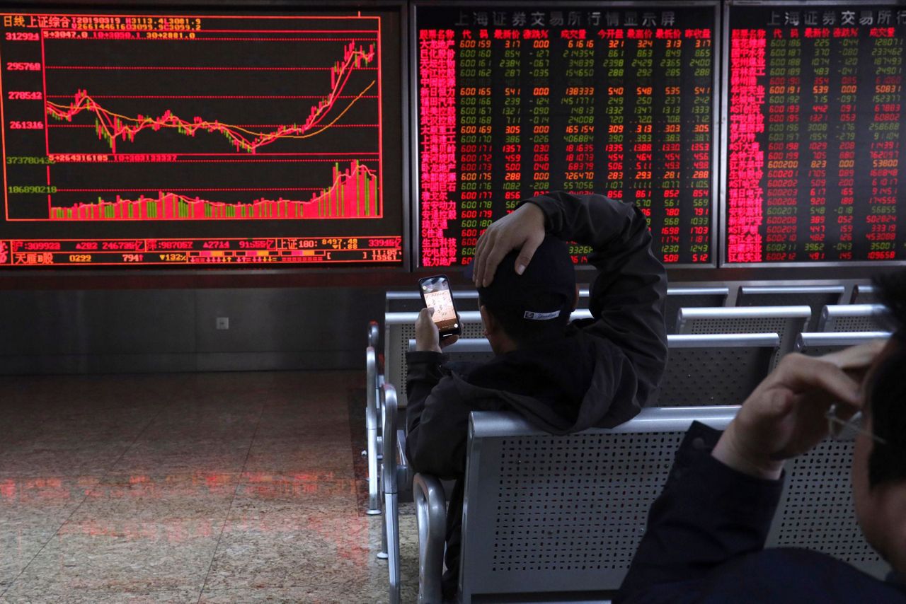 Asian shares mixed in muted trading ahead of US Fed meeting