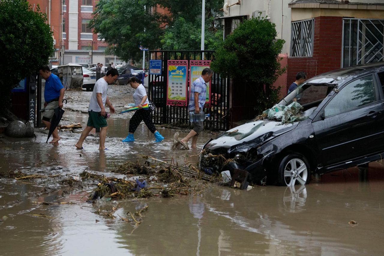 11 dead and 27 missing in flooding around Beijing after days of rain ...