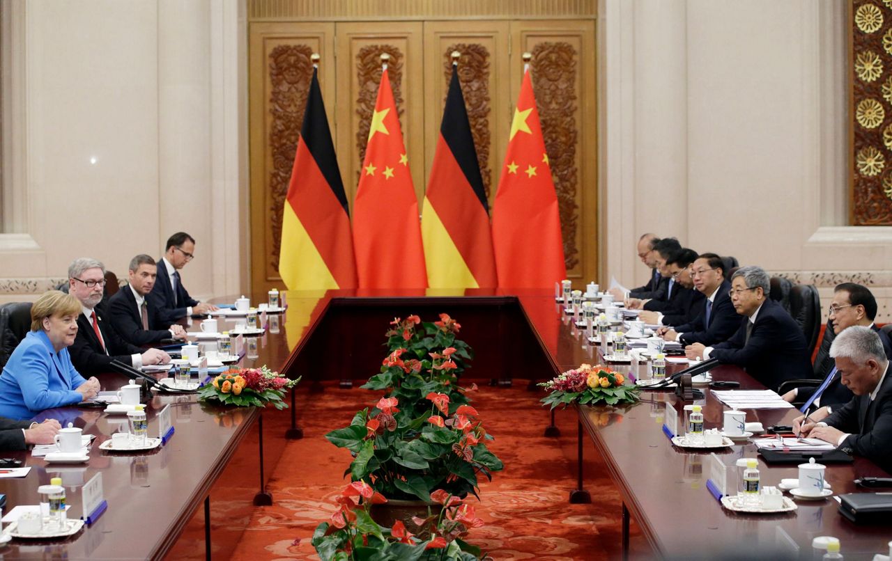 China's Li says German companies welcome amid US trade spat