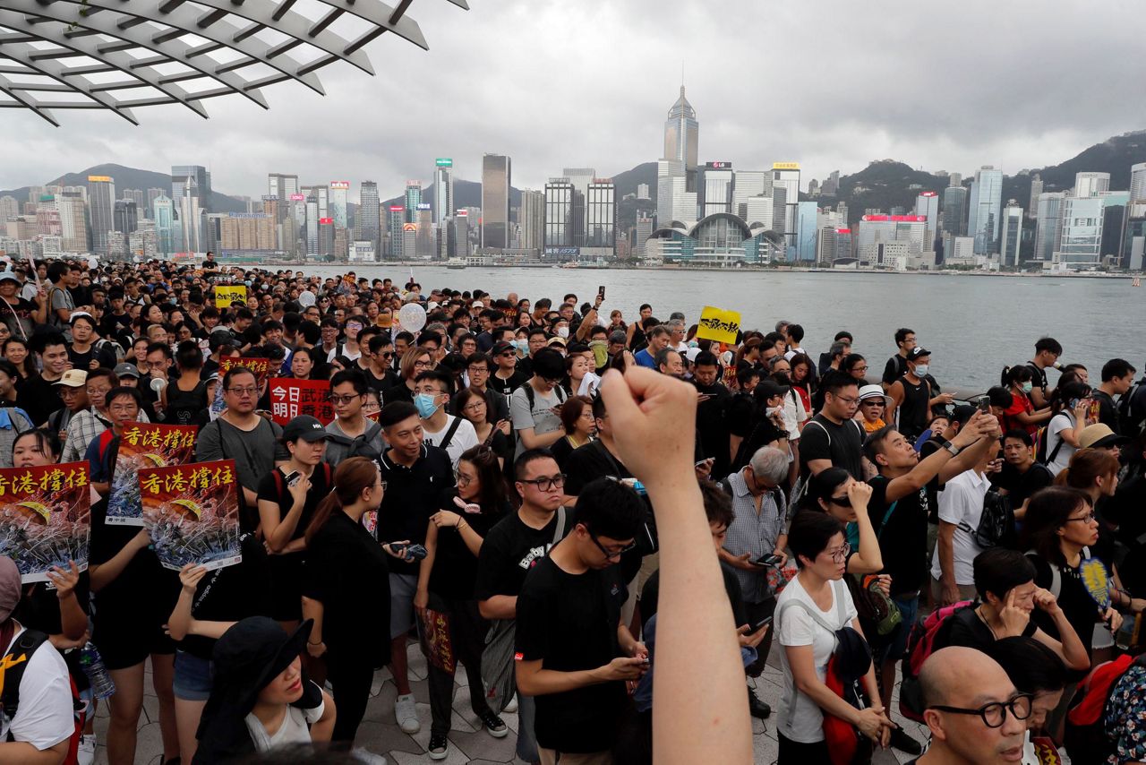 China waiting out Hong Kong protests, but backlash may come