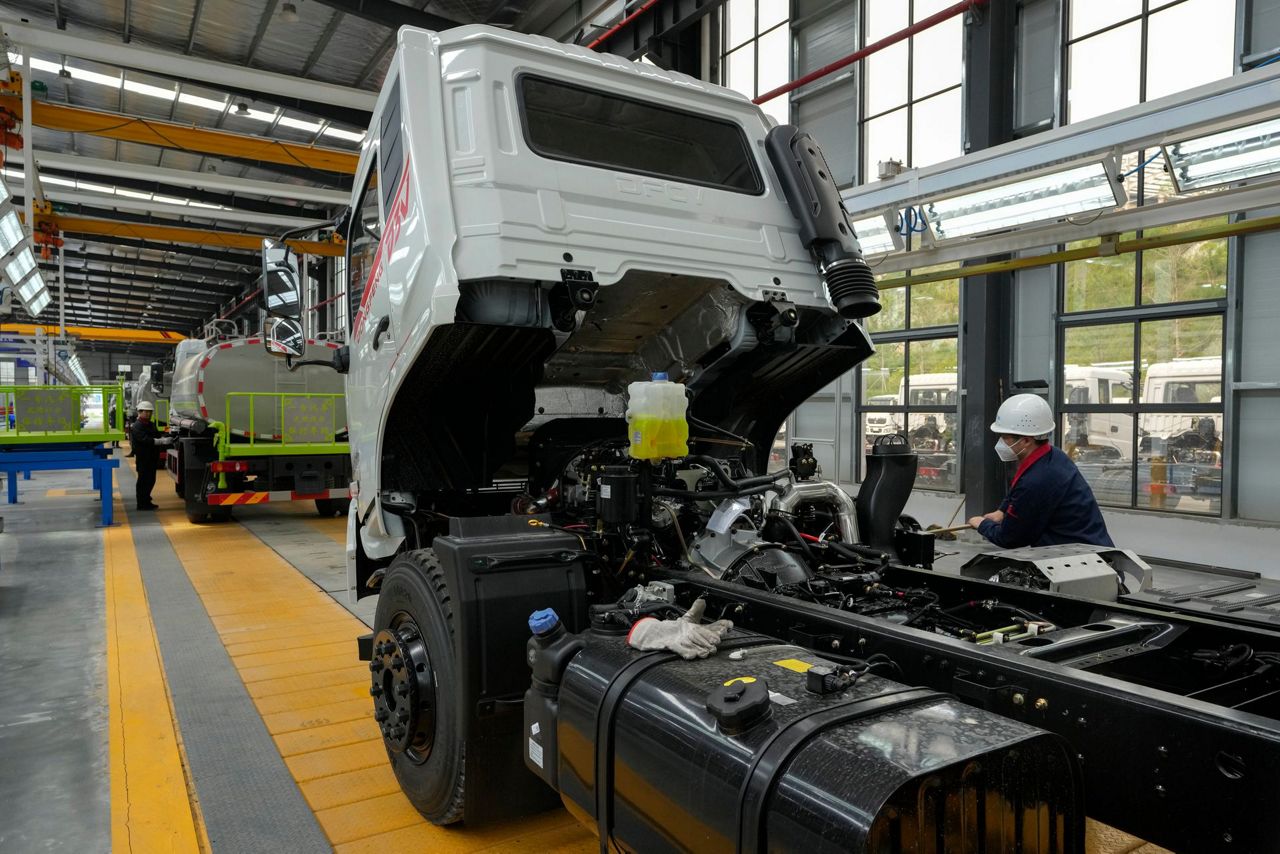 China factory activity slows, adding to economic strains