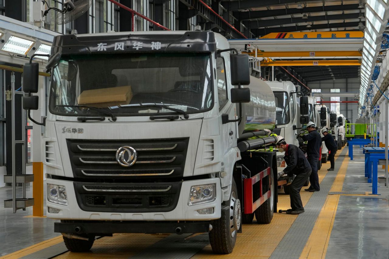 China factory activity slows, adding to economic strains