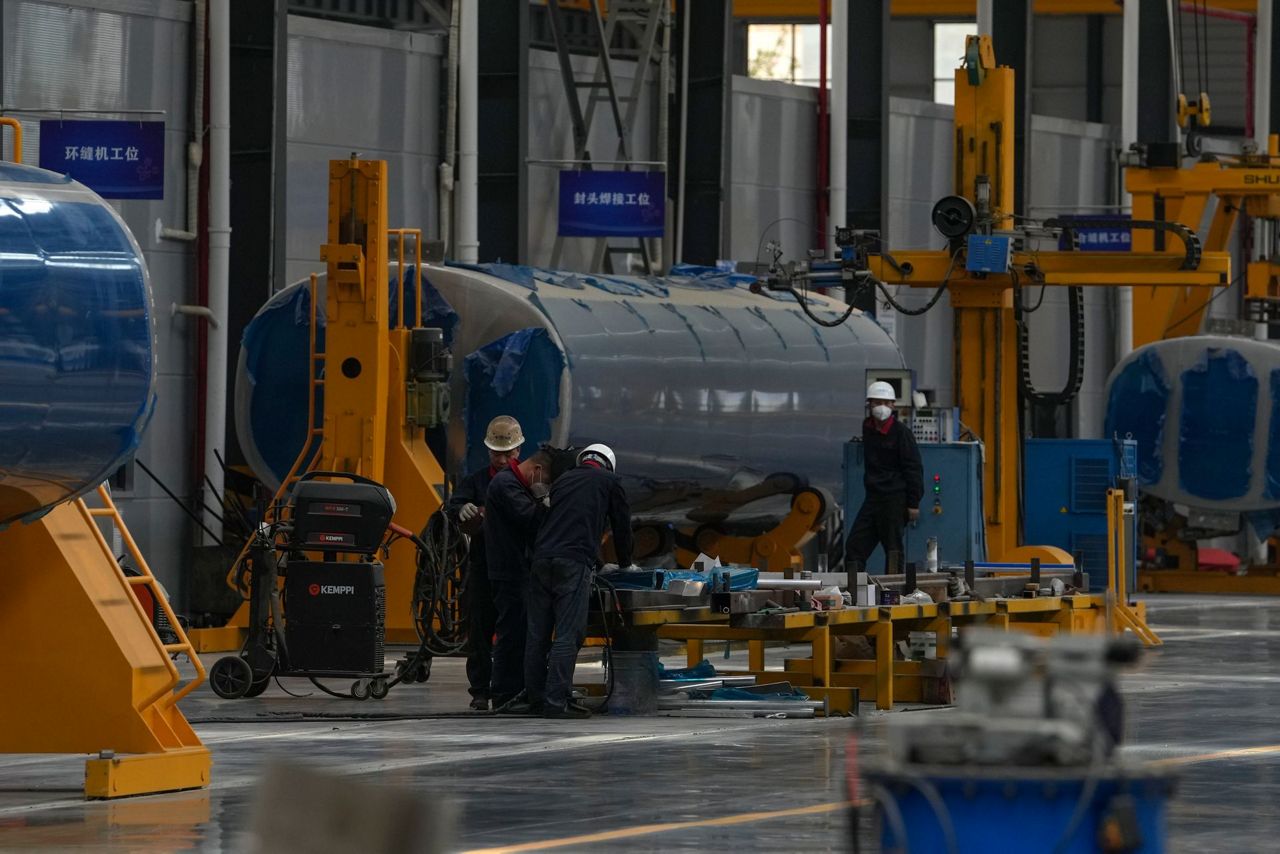 China factory activity slows, adding to economic strains
