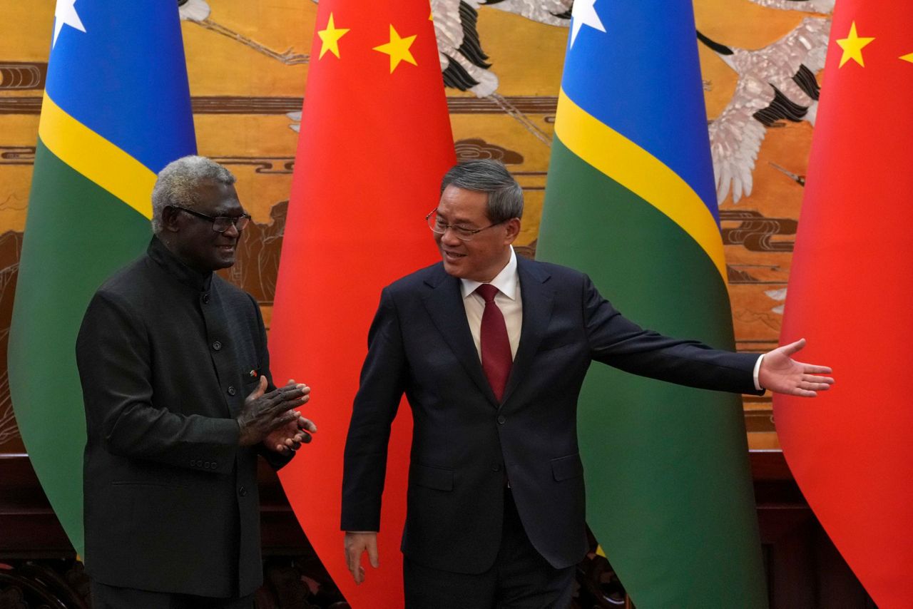 China signs pact with Solomon Islands to boost cooperation on 'law ...