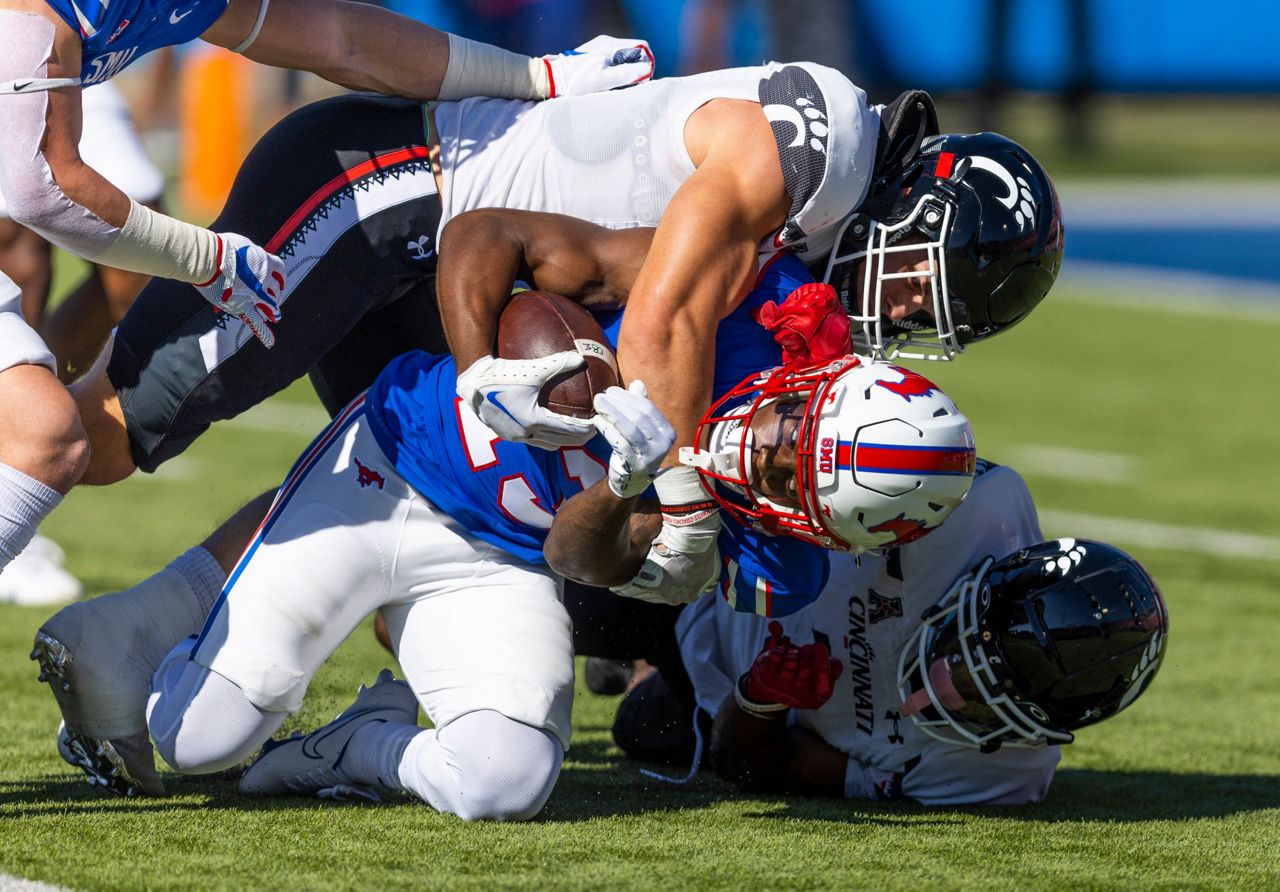 No. 21 Cincinnati holds on to edge SMU 29-27