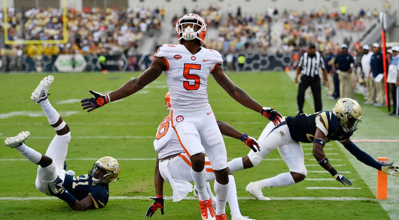 Lawrence throws 4 TDs, No. 3 Clemson routs Ga Tech 49-21