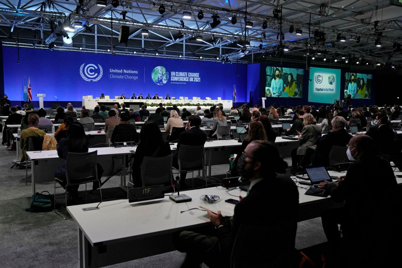 The Latest: Chair of climate summit wants talks in high gear
