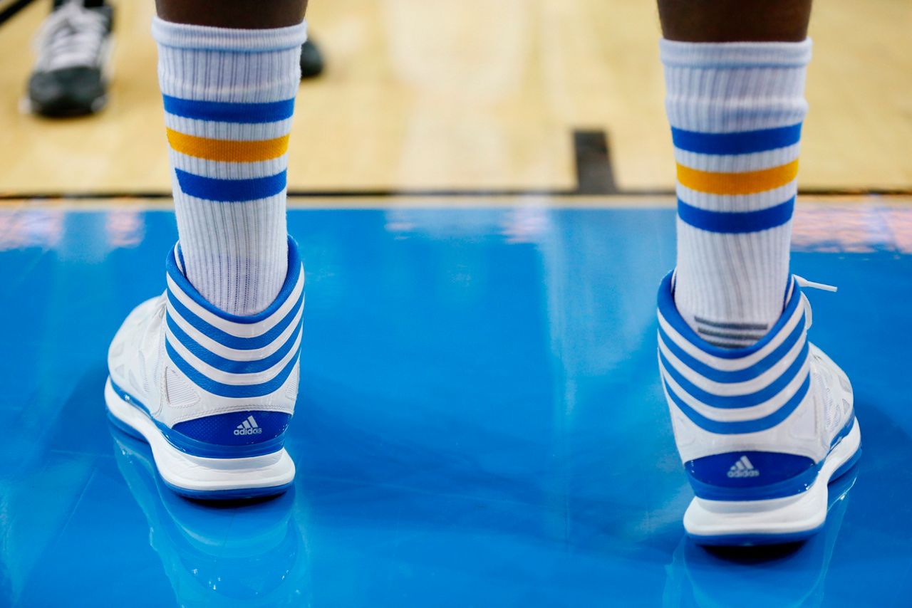 APNewsBreak: Hoops panel says ban cheats, end 1-and-done