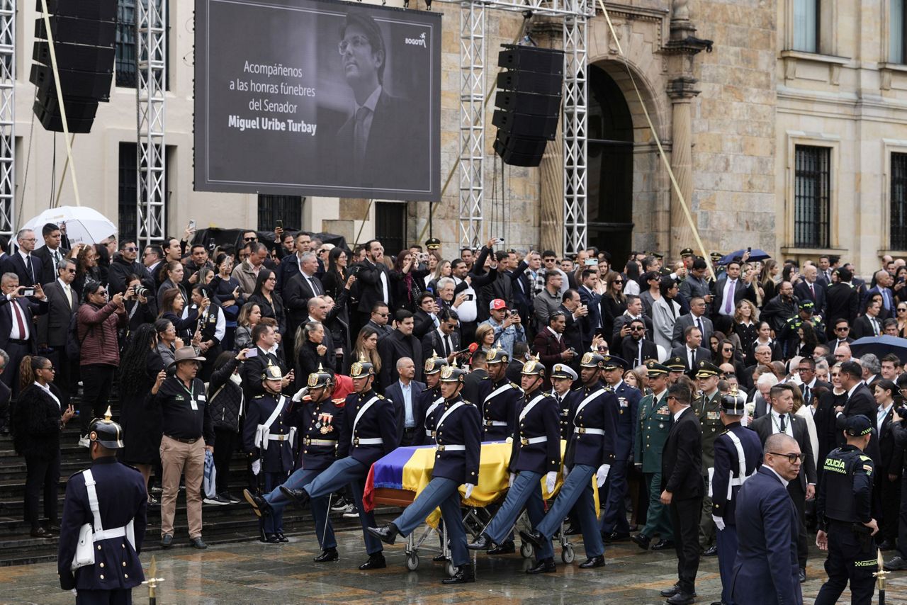 Colombians bid farewell to presidential hopeful Uribe after shooting at ...