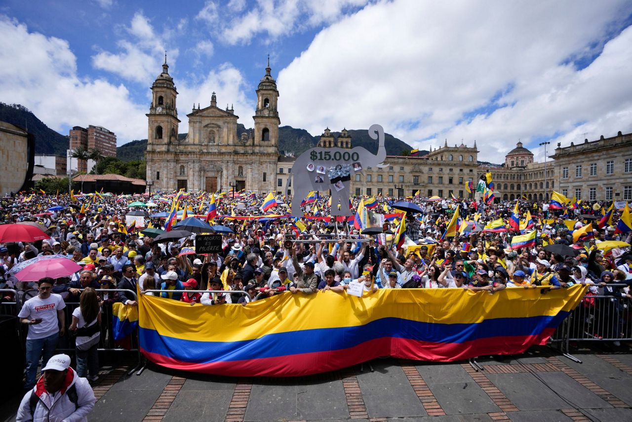 Thousands take to the streets in Colombia to protest leftist government ...