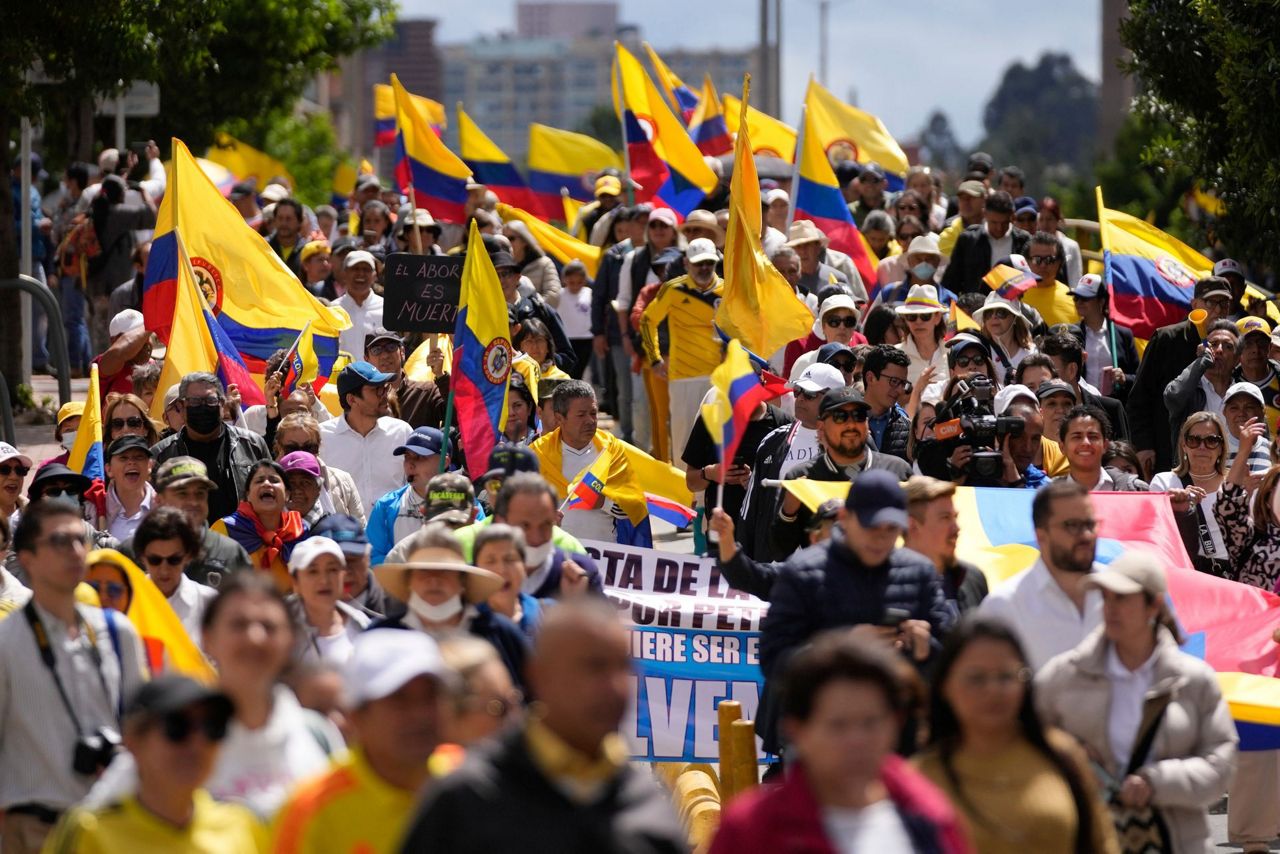 Thousands take to the streets in Colombia to protest leftist government ...