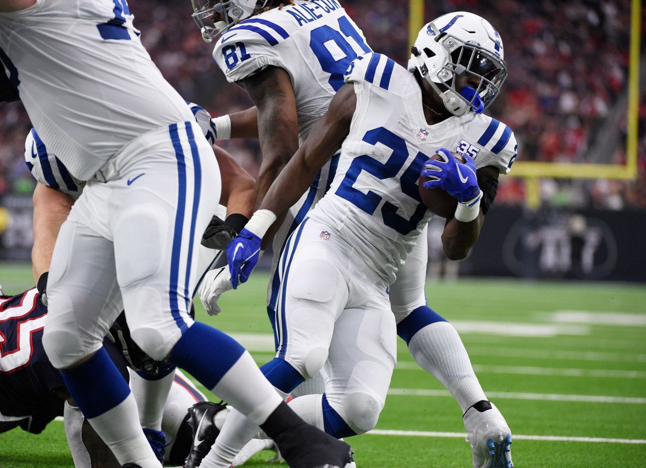 Colts use balanced attack to down Texans 21-7 in wild card