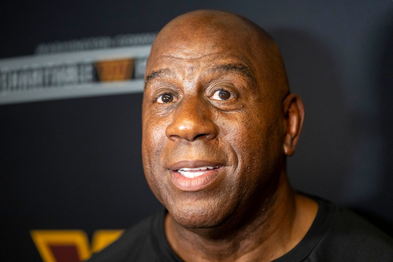 Magic Johnson, Josh Harris and other new Commanders owners introduce ...