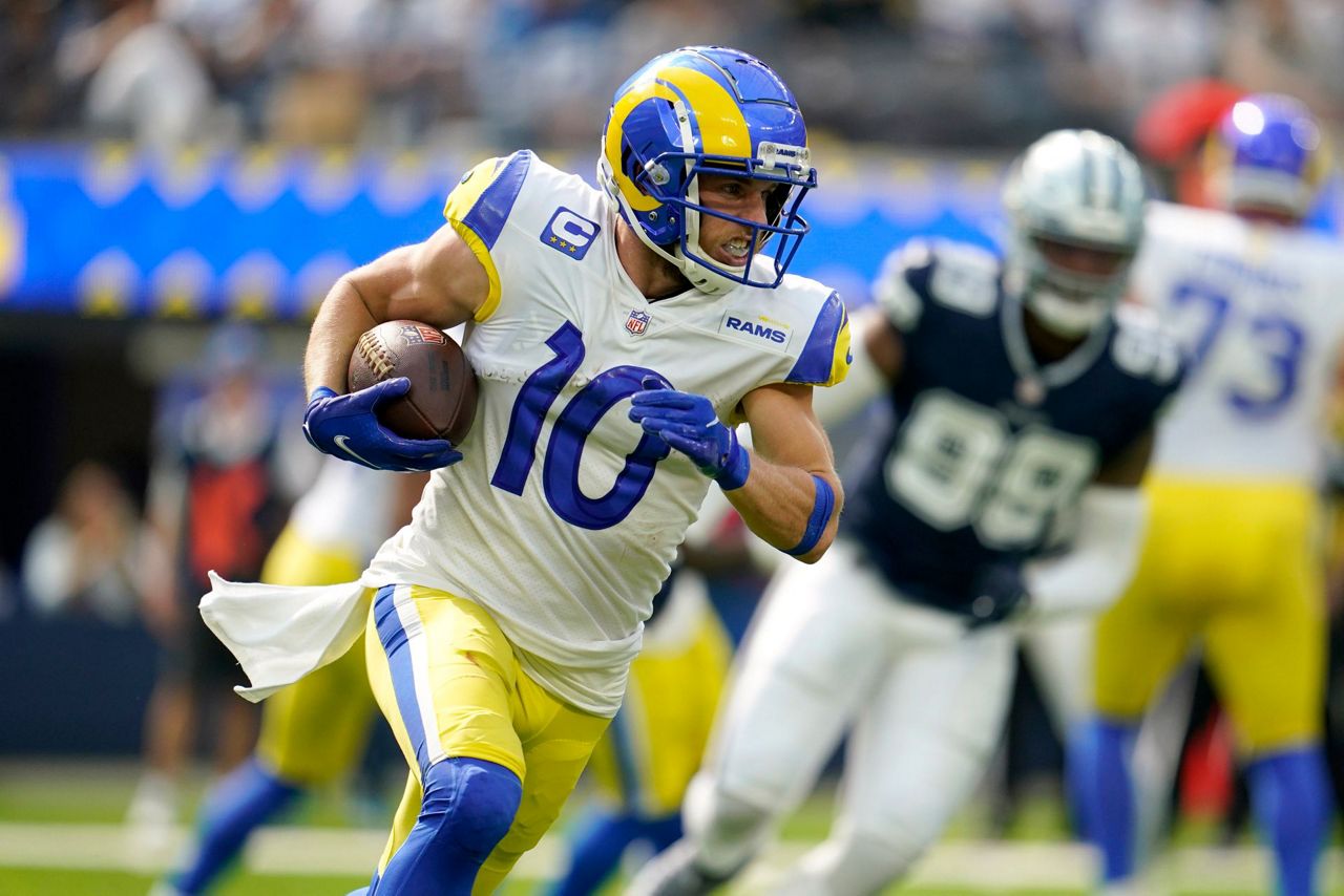 Dominant D puts Cowboys past Rams 22-10 for 4th straight win