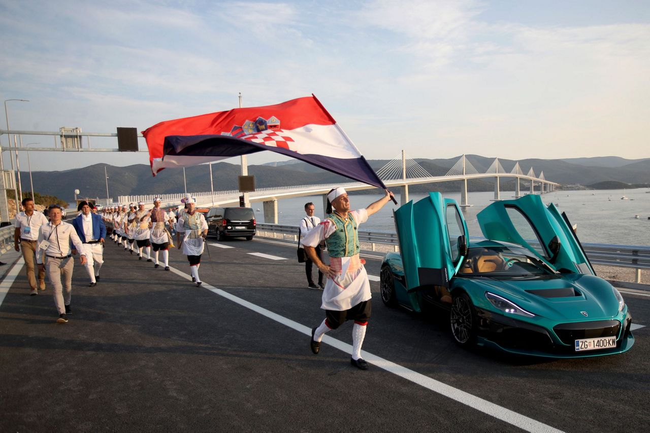 Croatia opens Adriatic coast bridge, linking divided region
