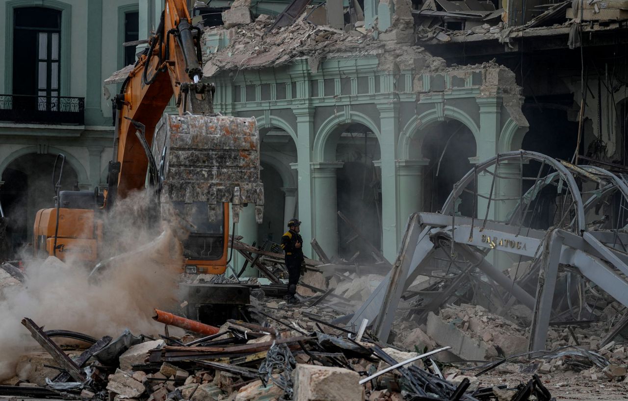 Rescuers look for victims at Cuba hotel after blast kills 22