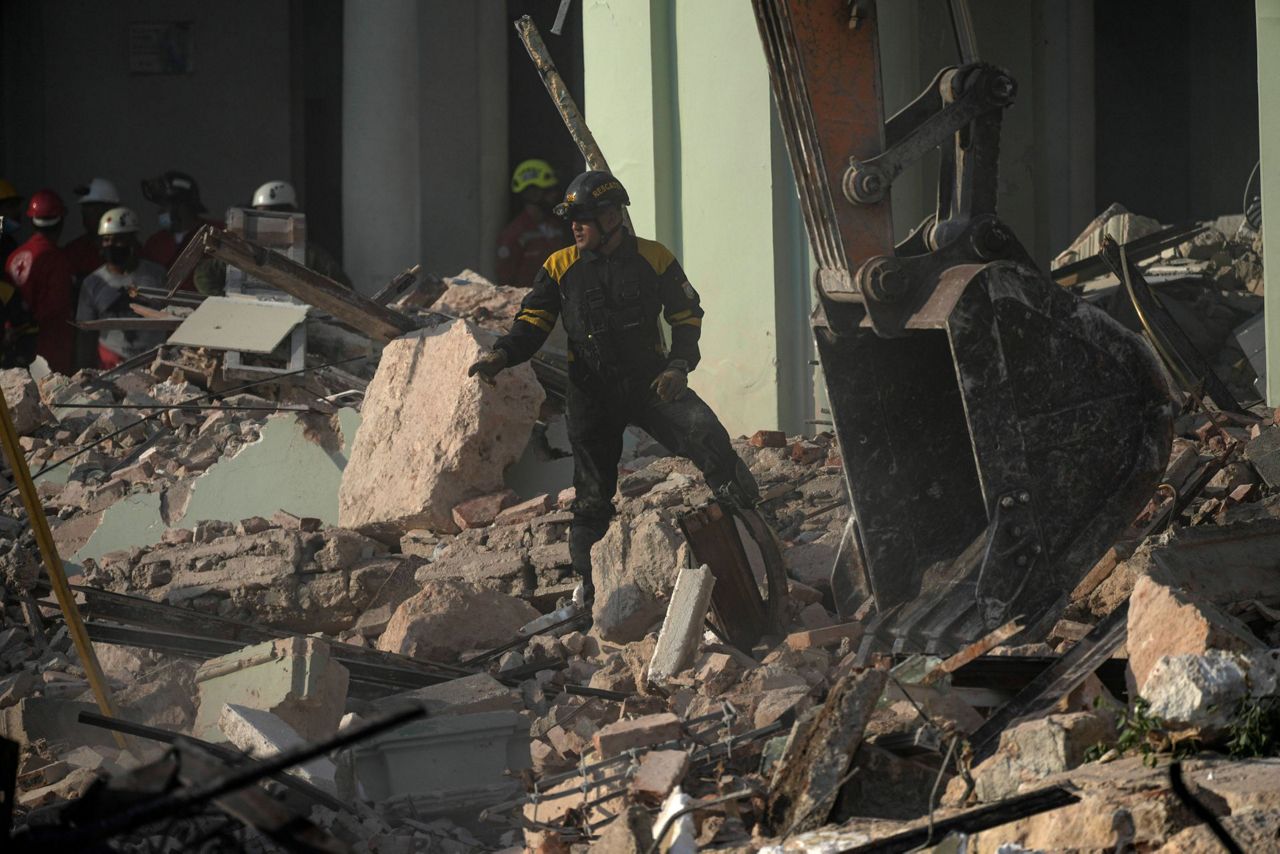 Rescuers look for victims at Cuba hotel after blast kills 22