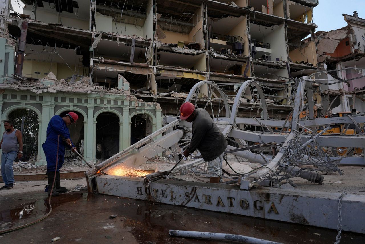 Rescuers look for victims at Cuba hotel after blast kills 22