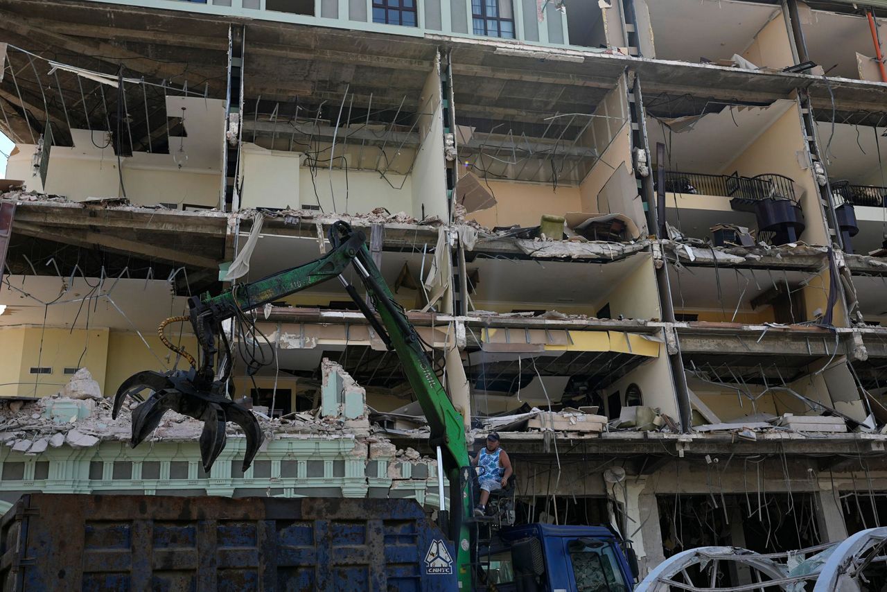 Rescuers look for victims at Cuba hotel after blast kills 22
