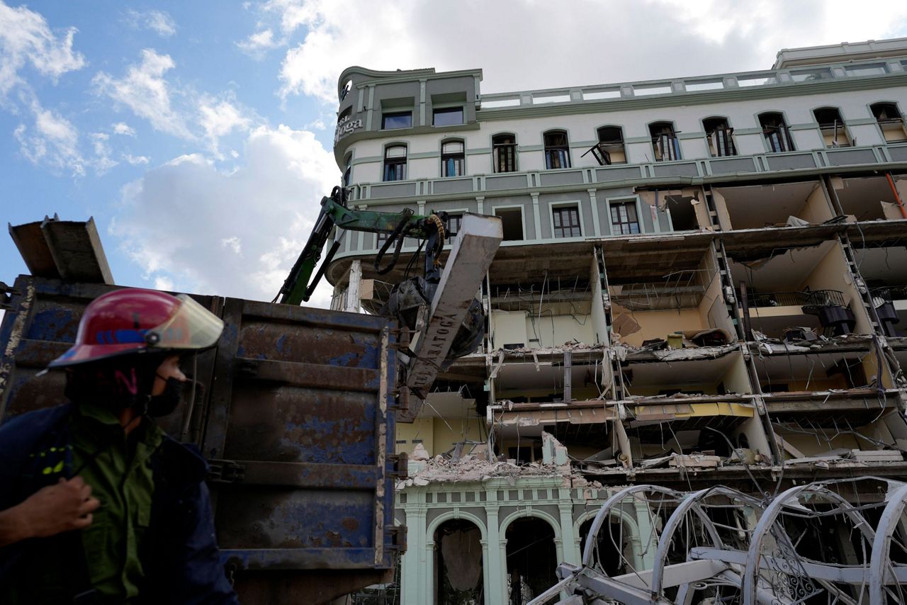 Rescuers look for victims at Cuba hotel after blast kills 22