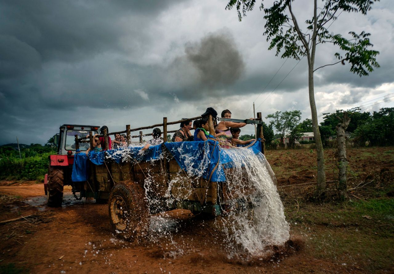 Inventive Cubans beat infernal heat with mobile pool