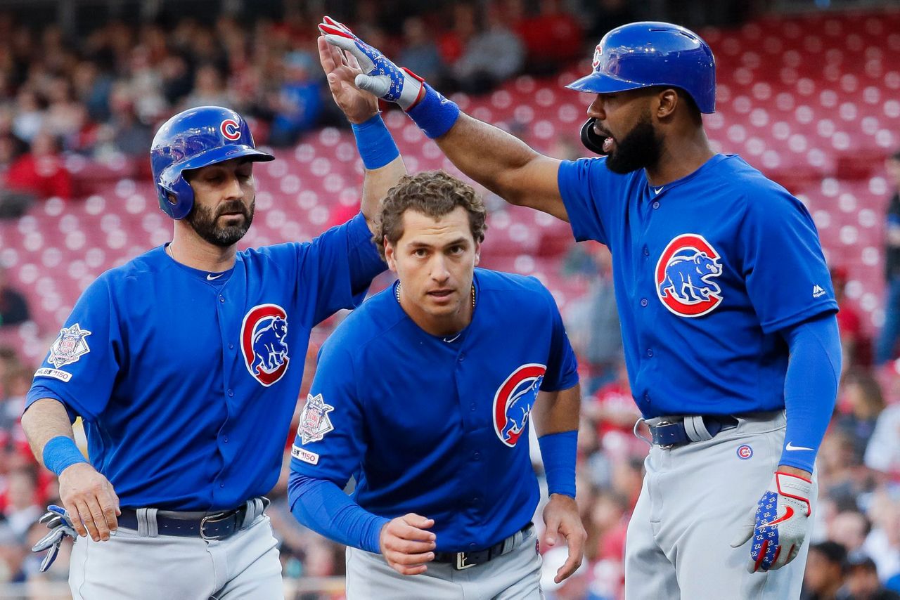 Hendricks has 2-run 2B, pitches into 9th; Cubs top Reds 3-1