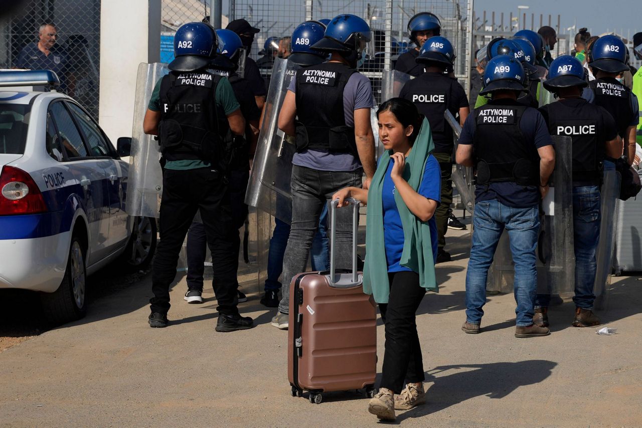 Fighting erupts at Cyprus migrant camp; 2 hurt, tents ablaze