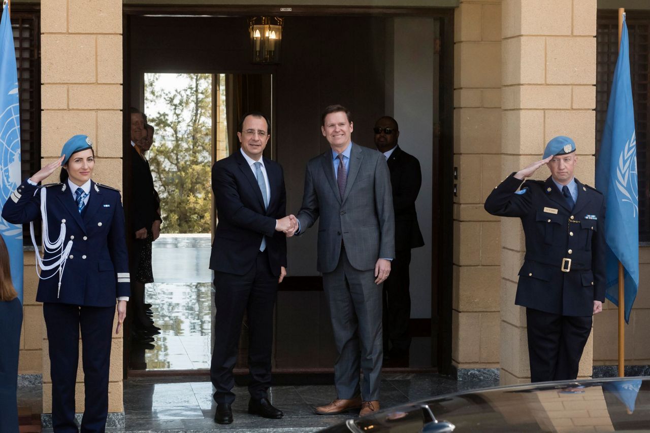 Divided Cyprus' new president scopes out peace talks reset