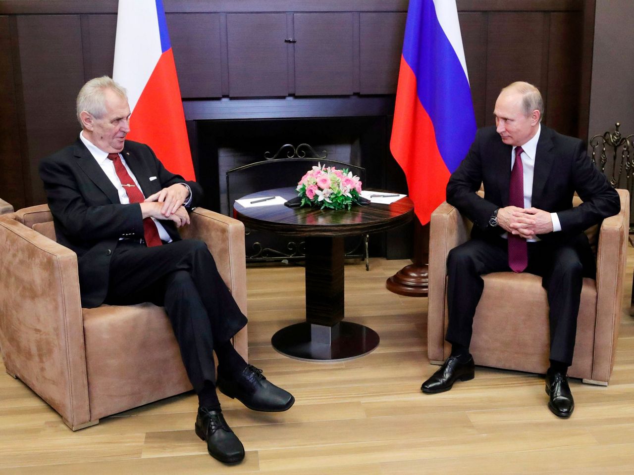 Czech President Milos Zeman leaves, opponents celebrate