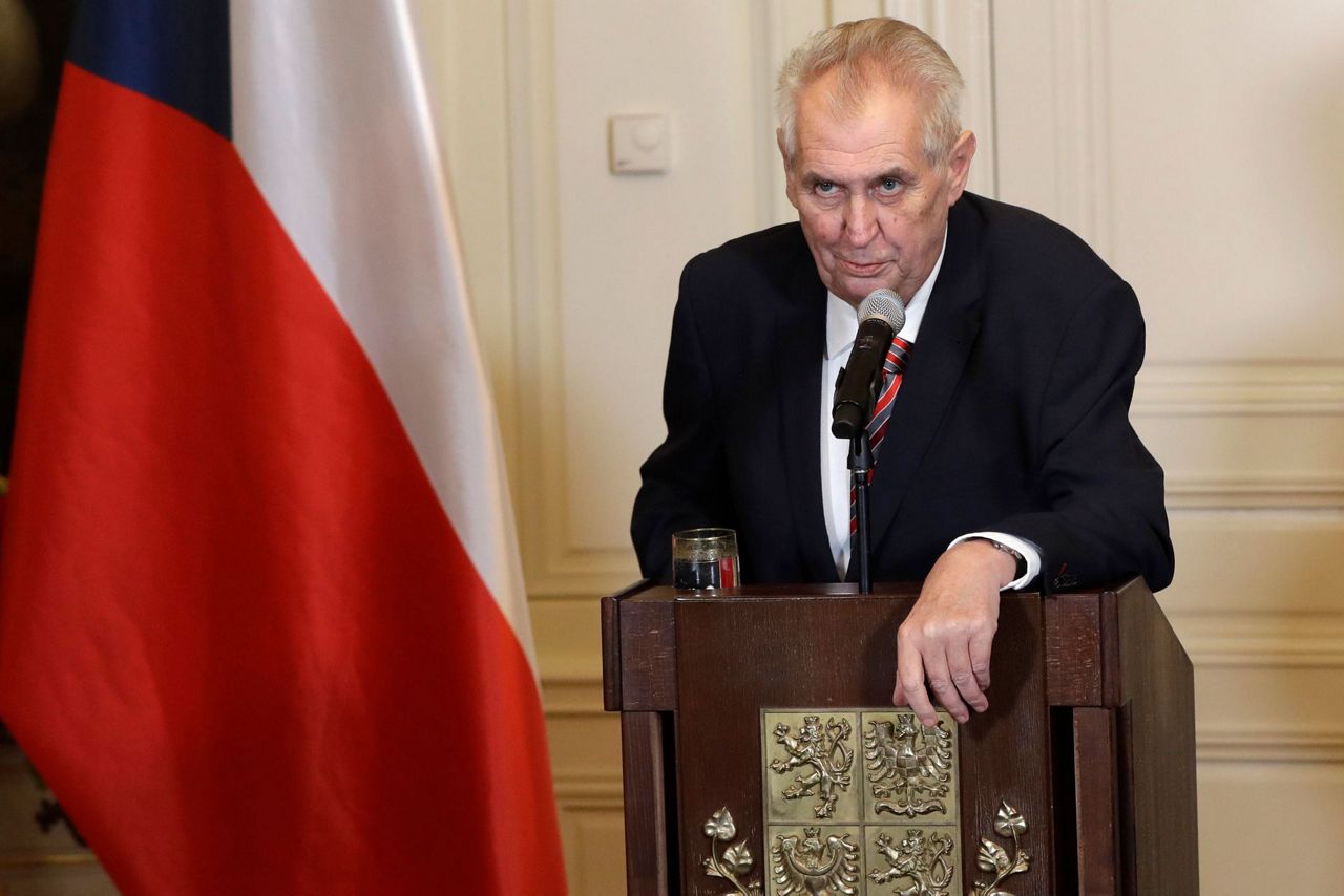 Czech President Milos Zeman leaves, opponents celebrate