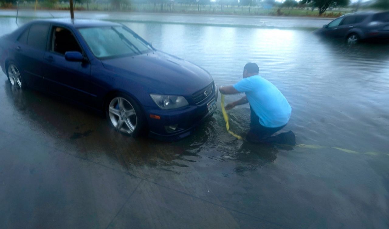 Heavy rain floods streets across Dallas-Fort Worth area