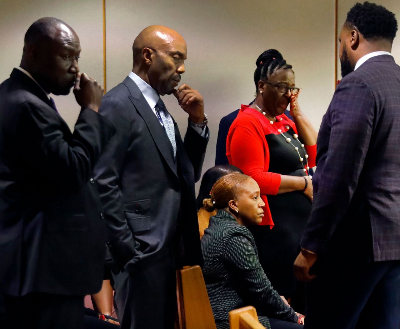 Slain man’s brother, judge hug ex-cop sentenced to 10 years