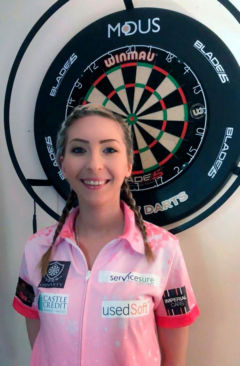 AP Interview: Darts queen on fame, equality and trailblazing